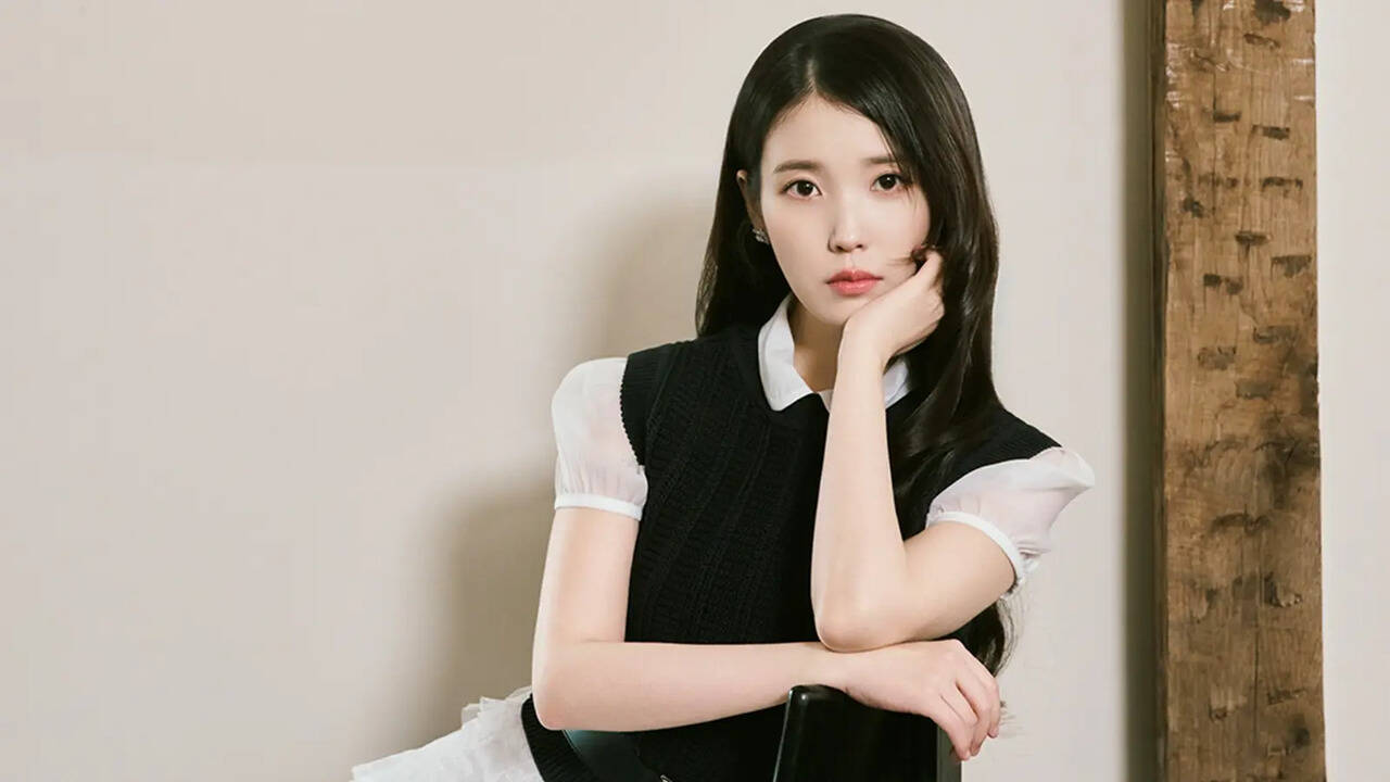 Following the success of Perfect Crown, what has led to IU facing ...