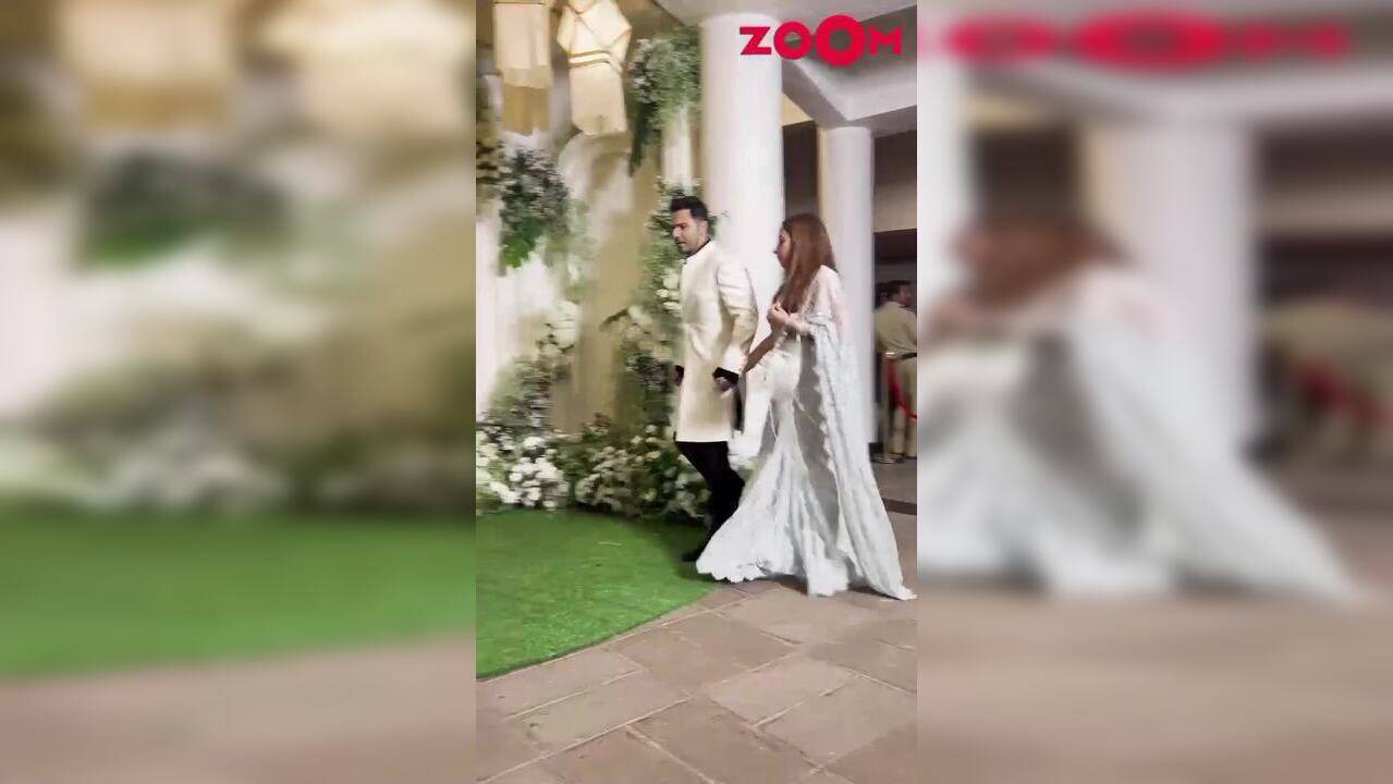 Varun Dhawan HOLDS wife Natasha's hand as they arrive at Manish ...